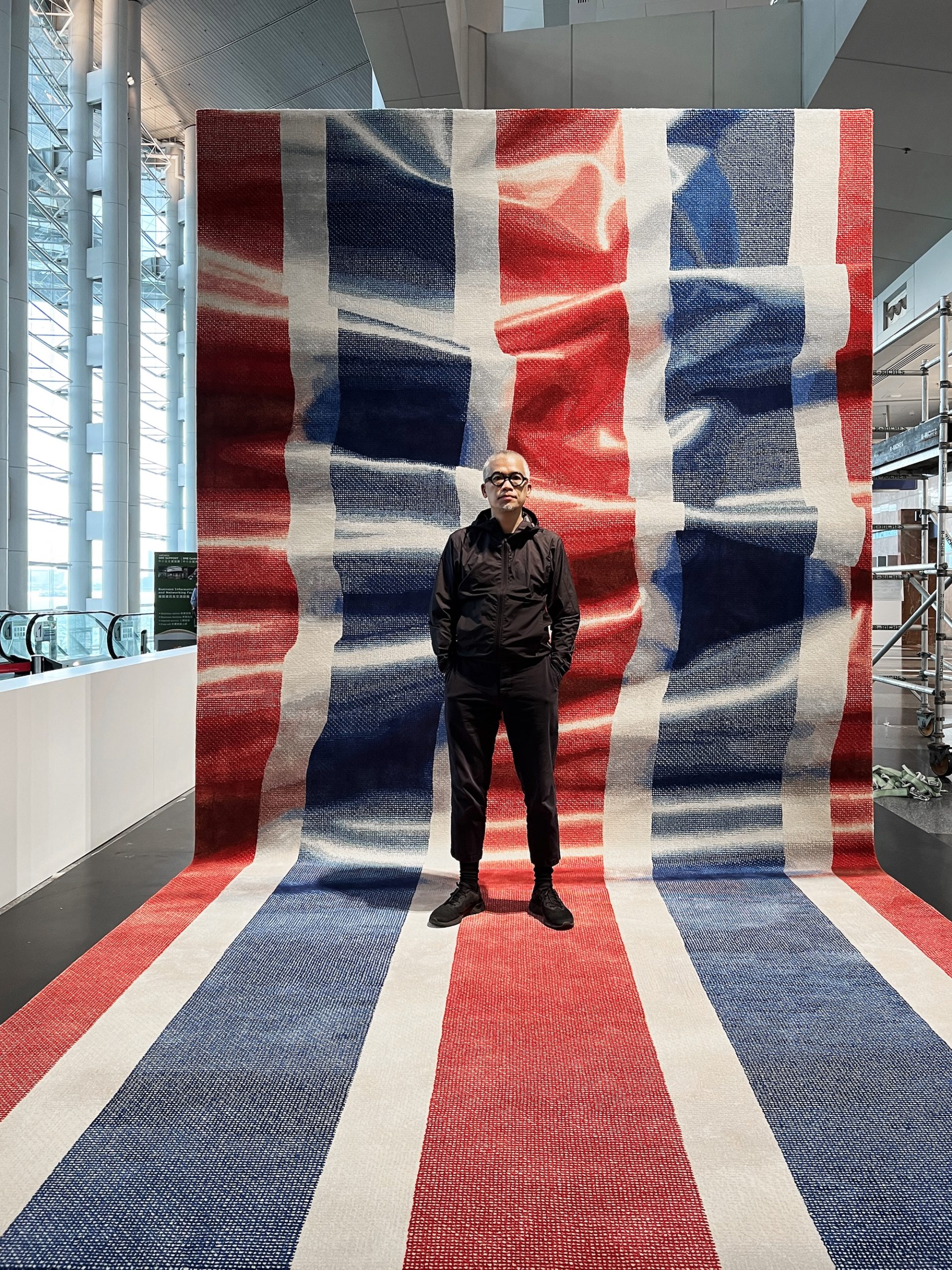 Stanley Wong aka anothermountainman, portrait in front of the Hong Kong ...